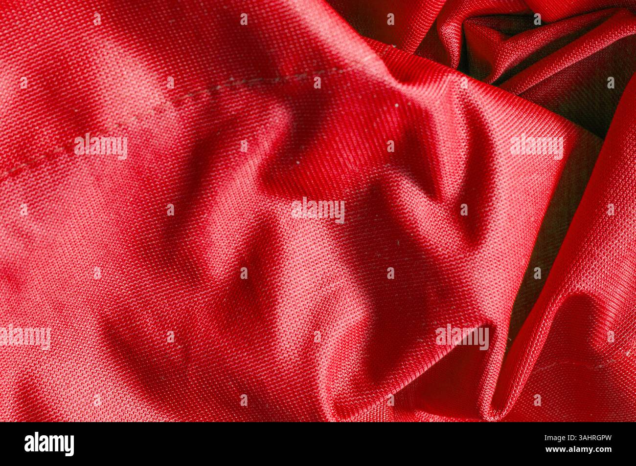 Wrinkled red fabric texture Stock Photo - Alamy
