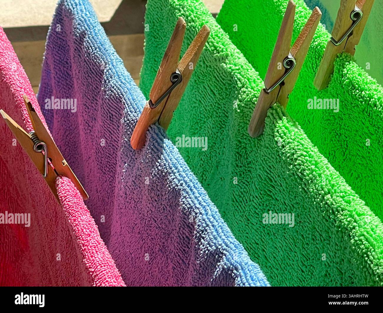 Hanging laundry color clothes smartphone stock photos and images - Alamy