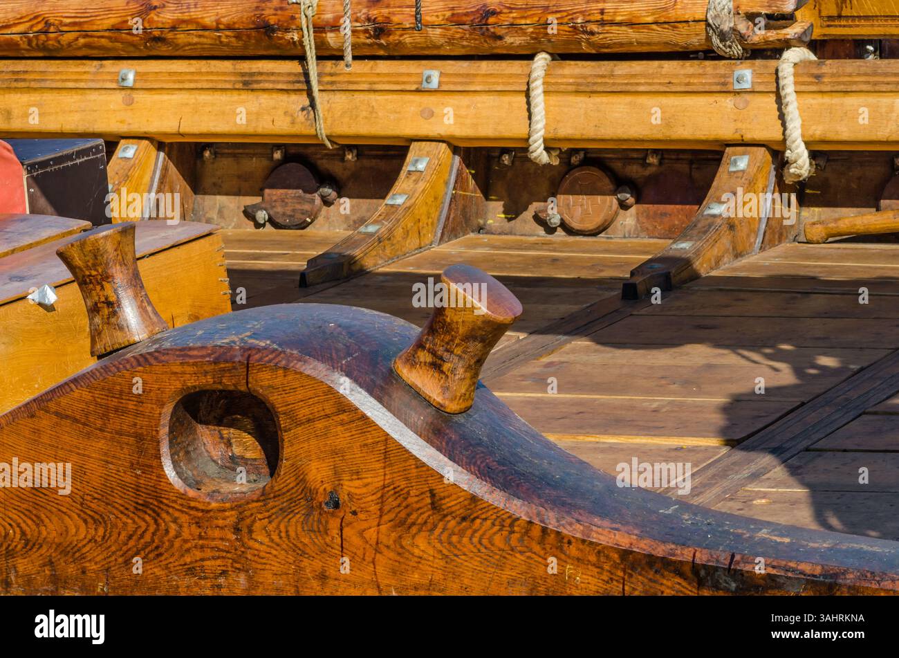 Carved wooden fixtures on a viking ship replica in the sunlight Stock ...