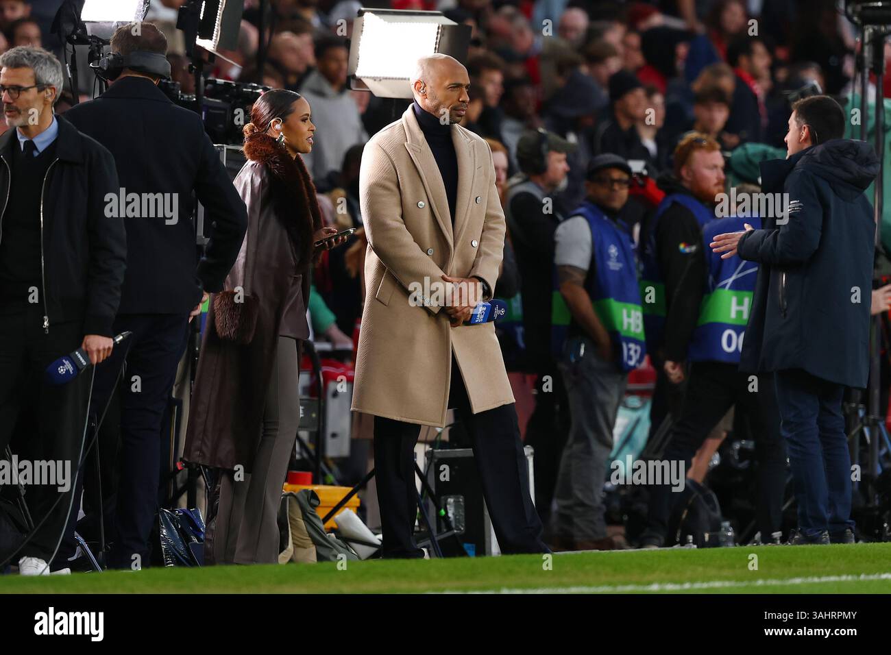 Former Arsenal player, Thierry Henry looks on - Arsenal v Real Madrid ...
