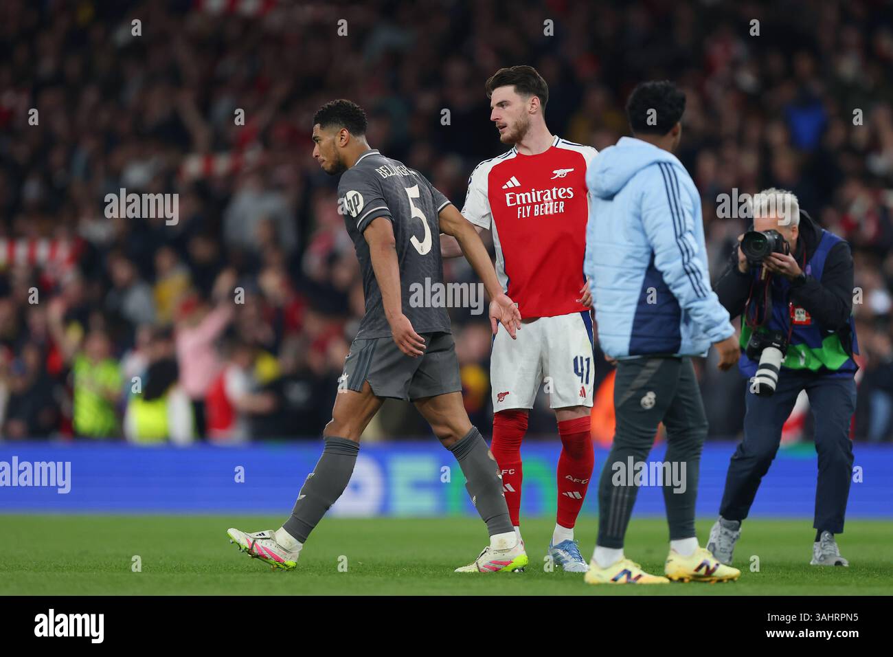 Jude Bellingham of Real Madrid walks past his England team mate, Declan ...