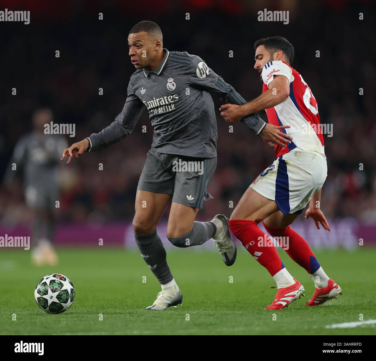 Kylian Mbappe of Real Madrid and Mikel Merino of Arsenal- Arsenal v ...