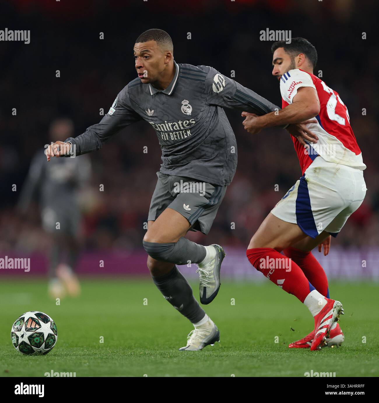 Kylian Mbappe of Real Madrid and Mikel Merino of Arsenal- Arsenal v ...
