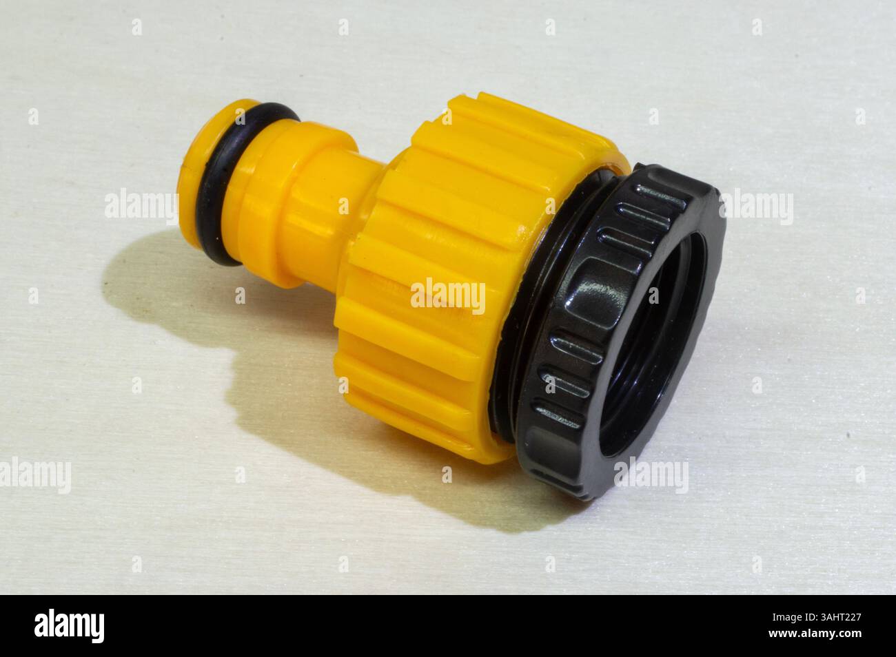 Plastic hose connector Stock Photo - Alamy