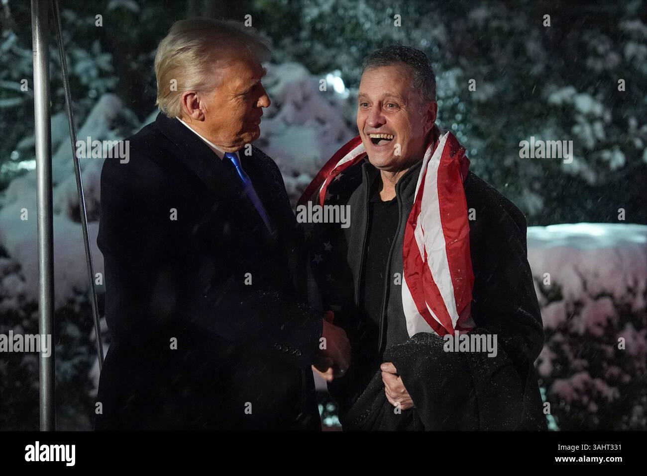 FILE - President Donald Trump greets Marc Fogel on the South Lawn at ...