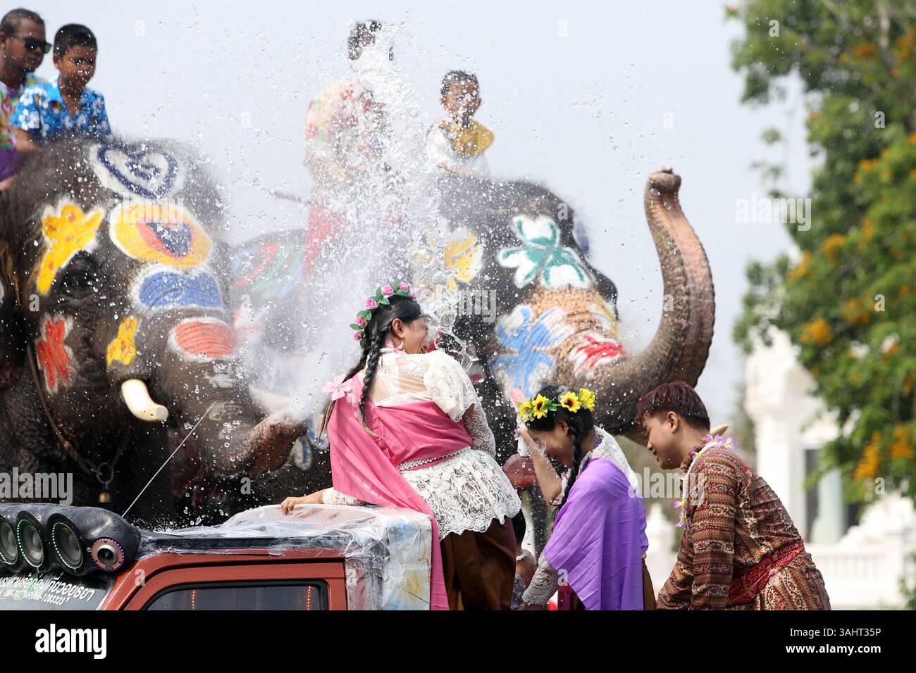 Ayutthaya, Thailand. 10th Apr, 2025. People and elephants splash water in celebration of the ...