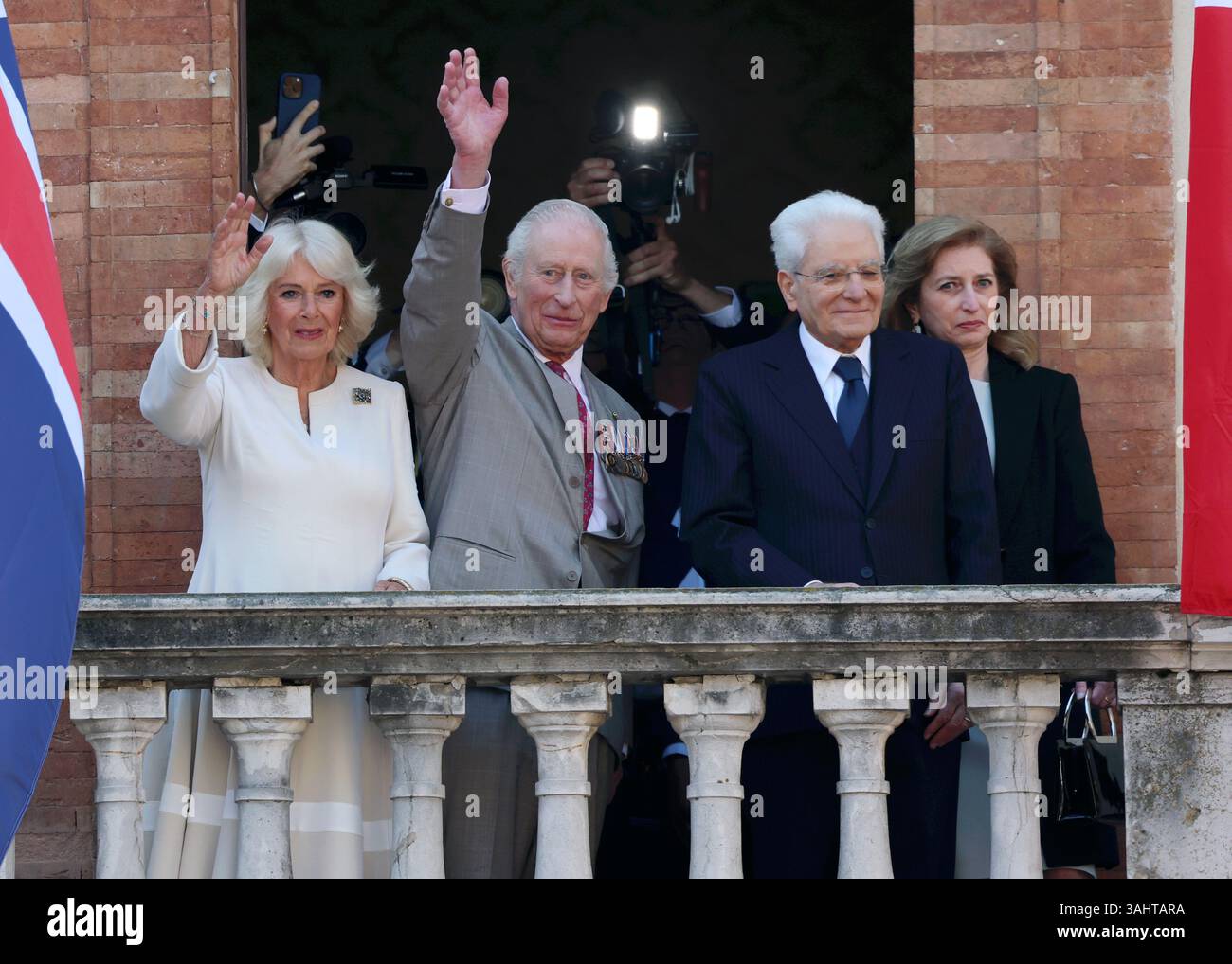 King Charles III and Queen Camilla wave from a balcony with President ...