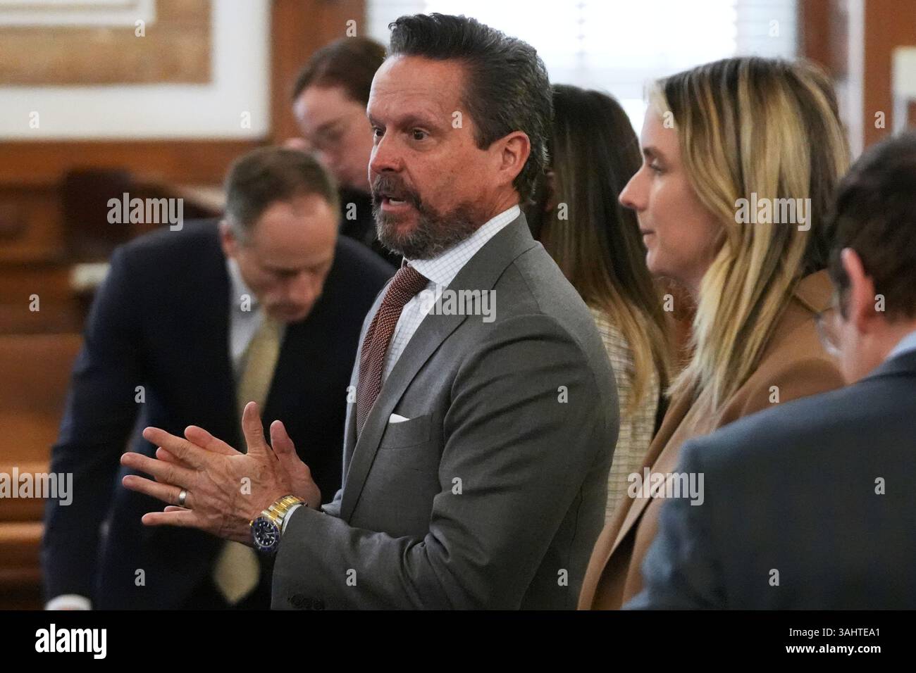 Defense attorney Alan Jackson introduces himself to prospective jurors ...