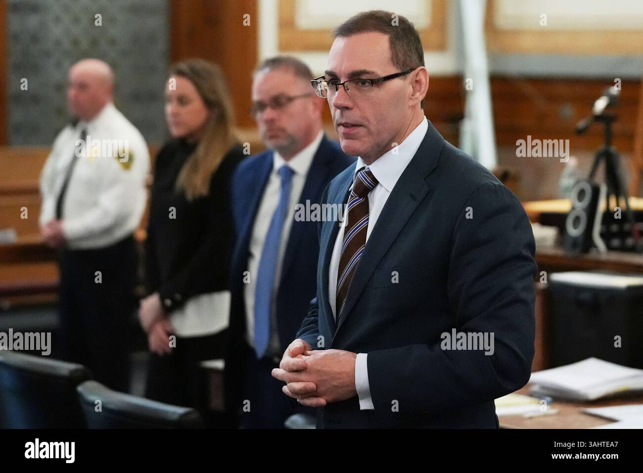 Prosecution attorney Hank Brennan introduces himself to prospective ...
