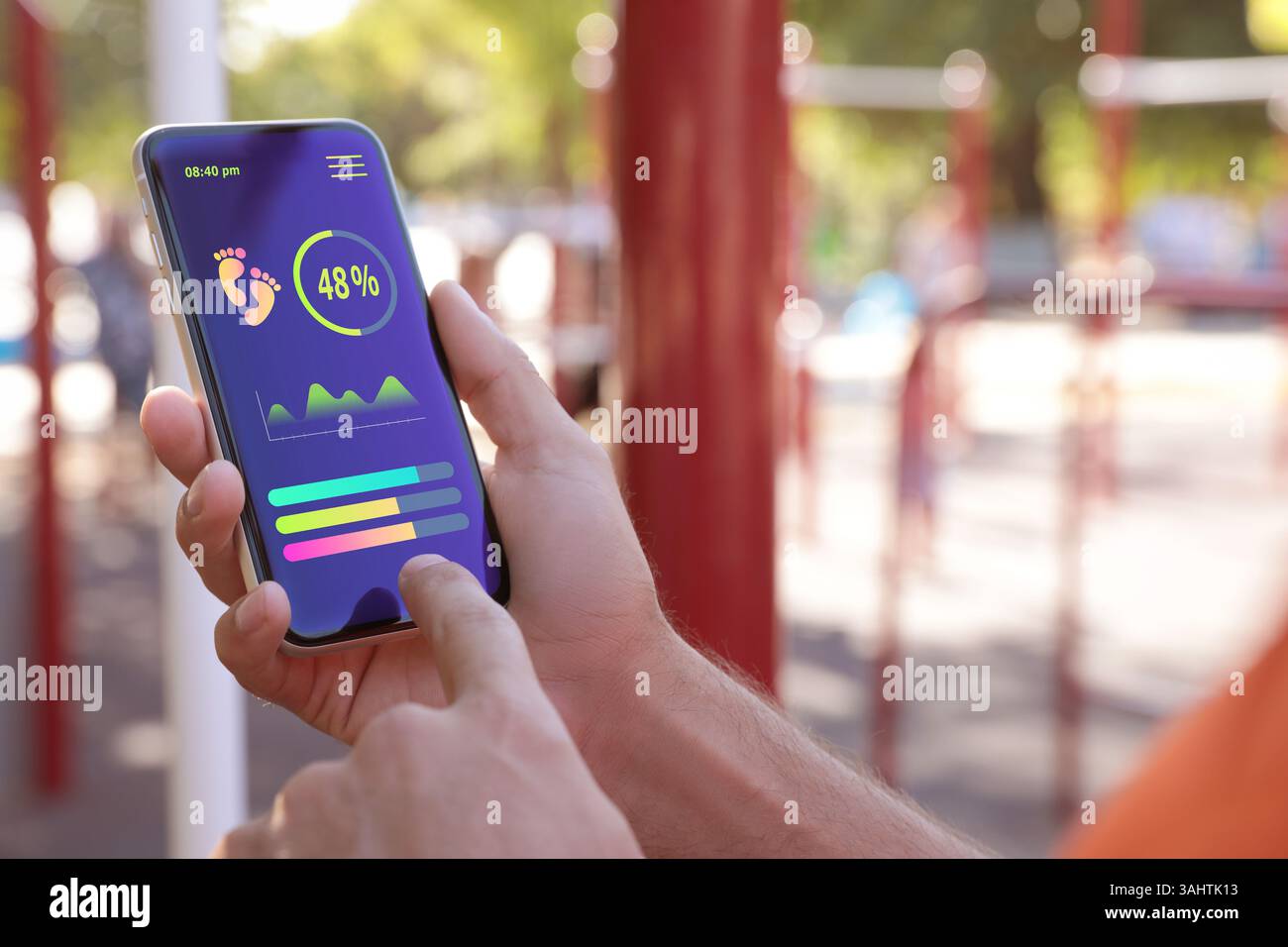 Man using step counting app on smartphone outdoors, closeup Stock Photo ...