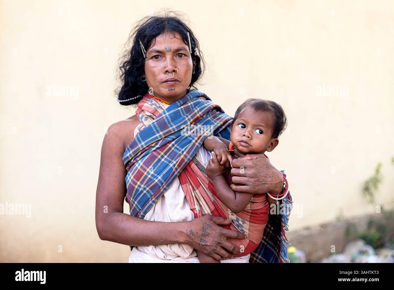 Mother with baby in traditional clothes from a Dongria Kondh tribe in ...