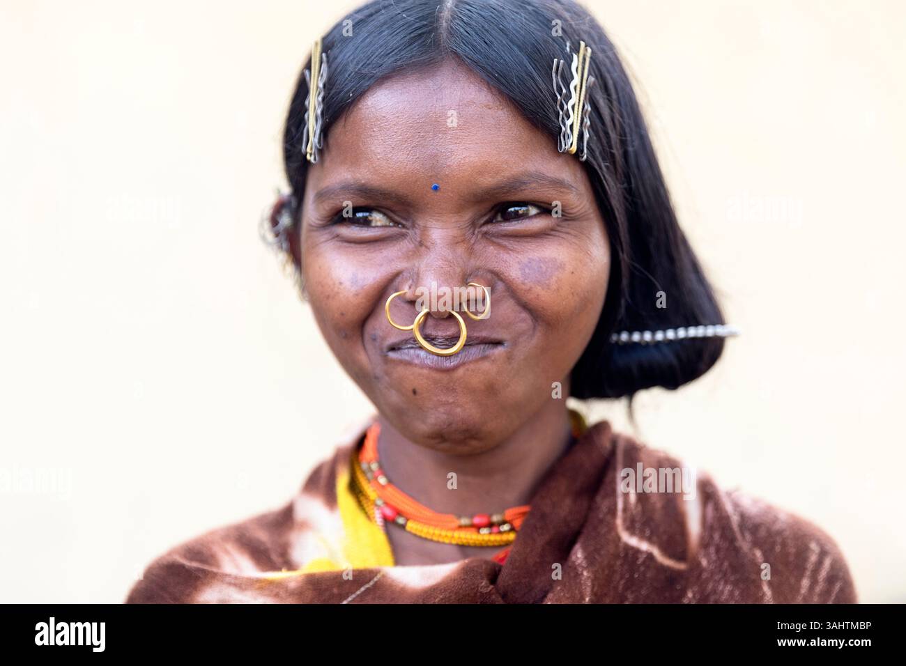Smiling woman in traditional clothes from a Dongria Kondh tribe in ...