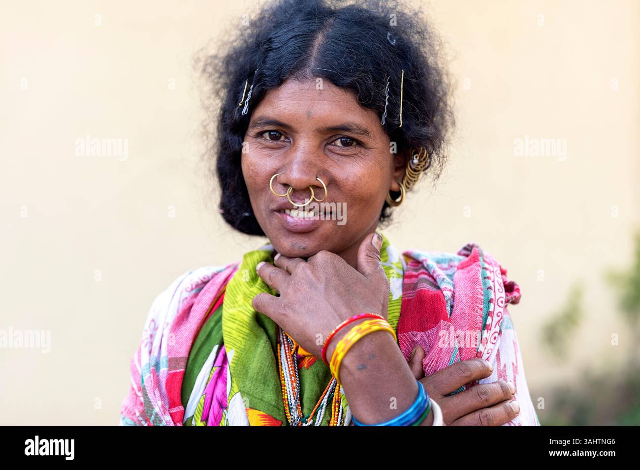 Smiling woman in traditional clothes from a Dongria Kondh tribe in ...