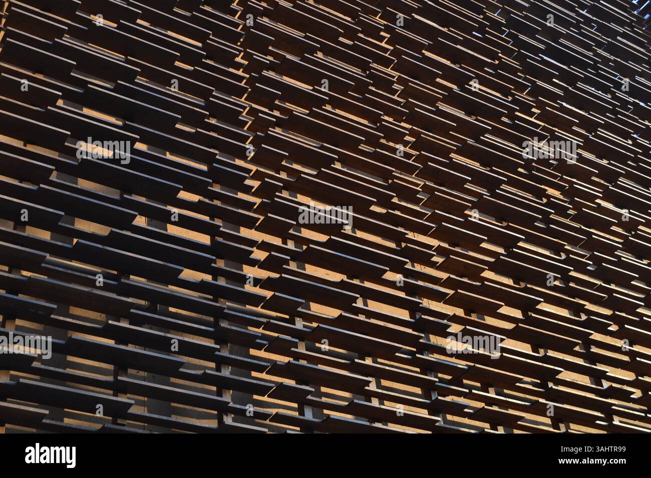 Architectural abstract of frame of long brown elaborated wooden board ...