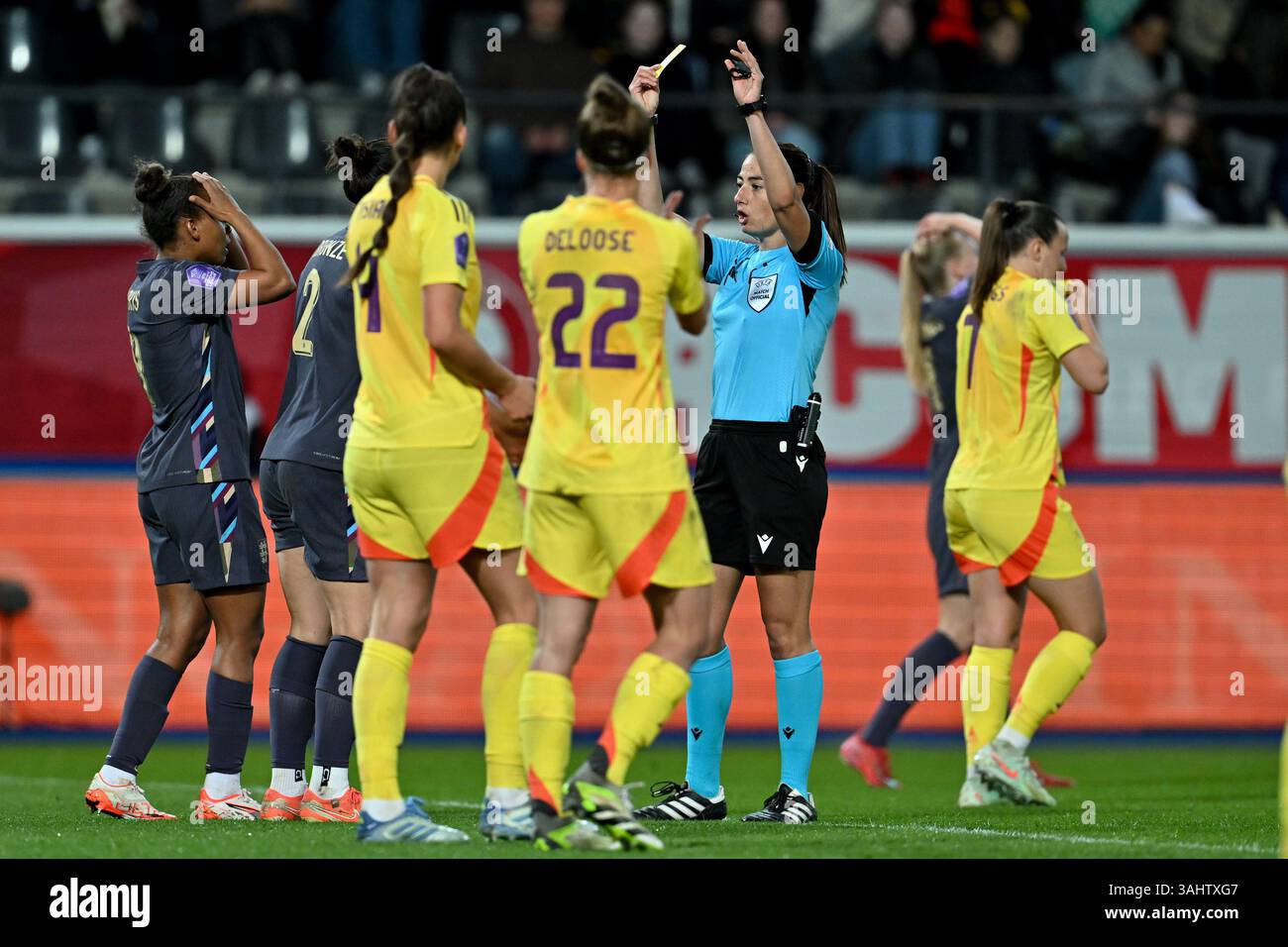 Lucy Bronze (2) of England receives a yellow card from referee Maria ...