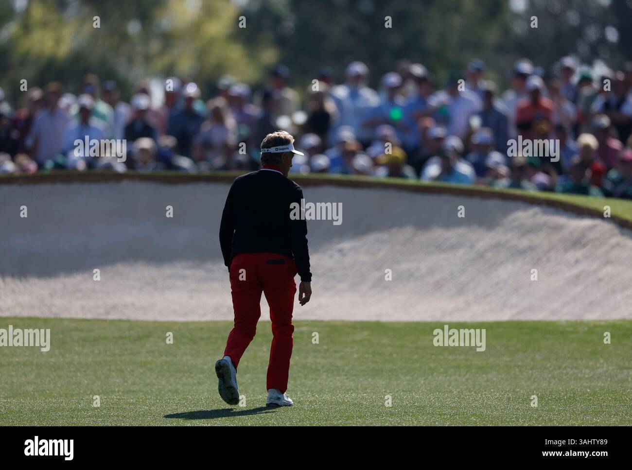 Bernhard Langer of Germany walks up to the seventh green during the ...