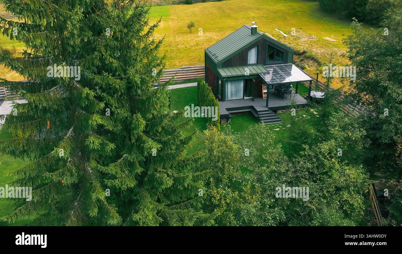 Modern House Surrounded by Lush Greenery in Rural Setting. A ...