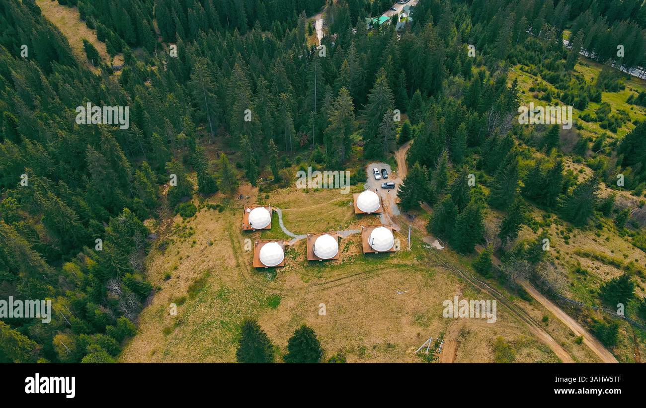 Aerial View of Geodesic Domes in Forest. Top-down shot of geodesic dome ...