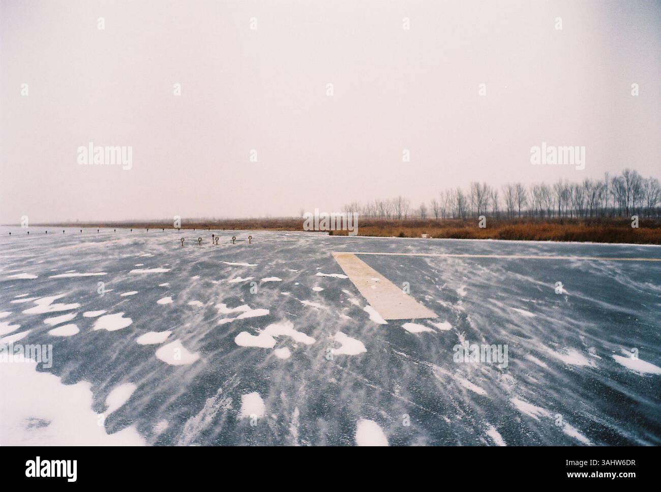 Small Airport Runway Entrance in Winter Snowstorm – Remote Airfield in ...
