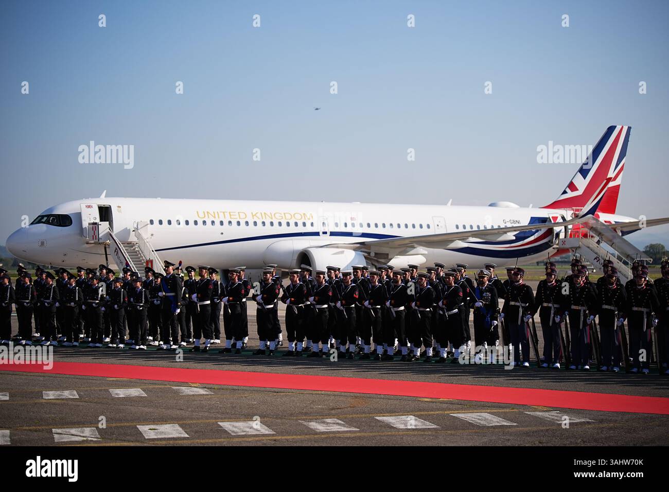 A guard of honour wait for King Charles III and Queen Camilla to depart ...