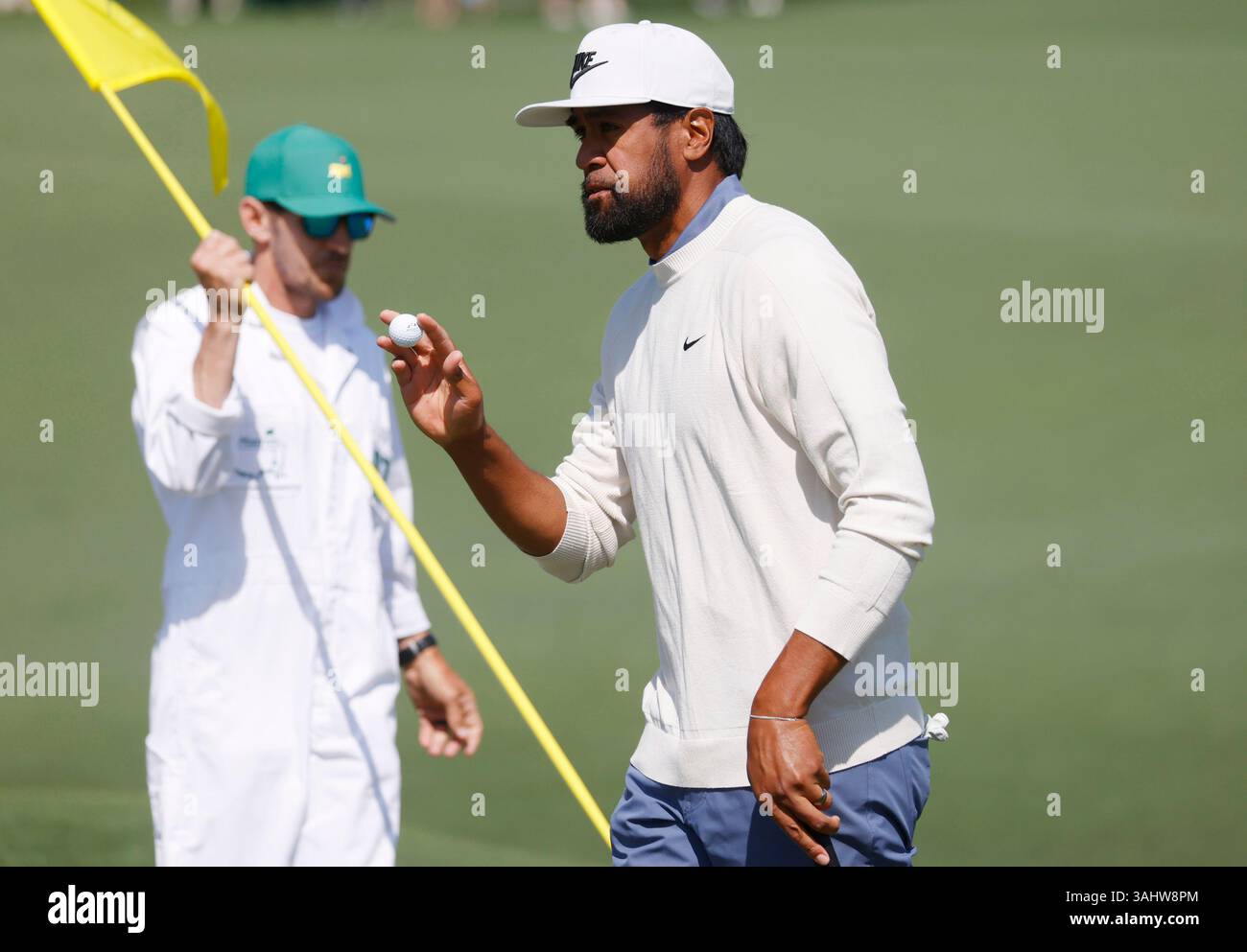 Augusta, United States. 10th Apr, 2025. Tony Finau reacts after sinking ...