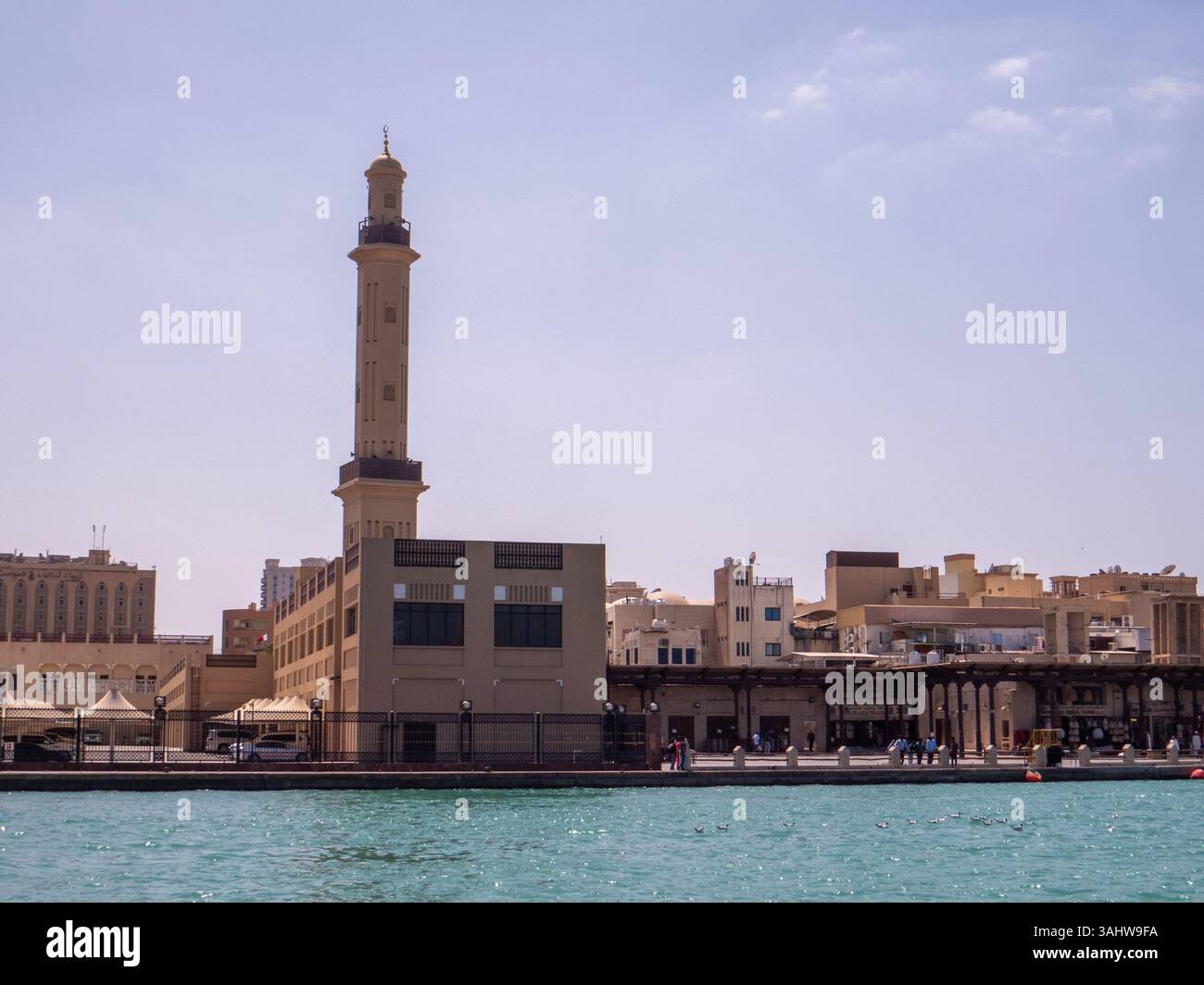 Dubai Museum in foreground with Juma Grand Mosque on the background in ...