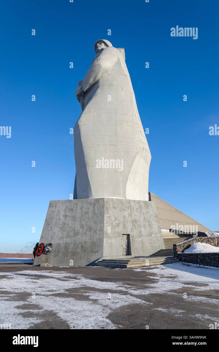 MURMANSK, RUSSIA - MARCH 11, 2025: Sculpture "Alyosha" against the blue ...