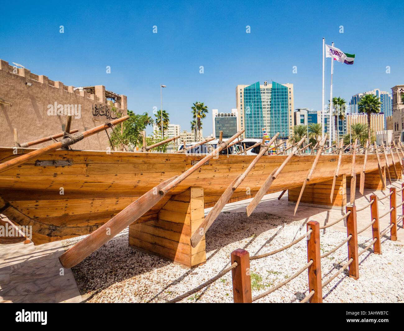Old boat on display near fahidi fort at Dubai Museum, UAE. Historical ...