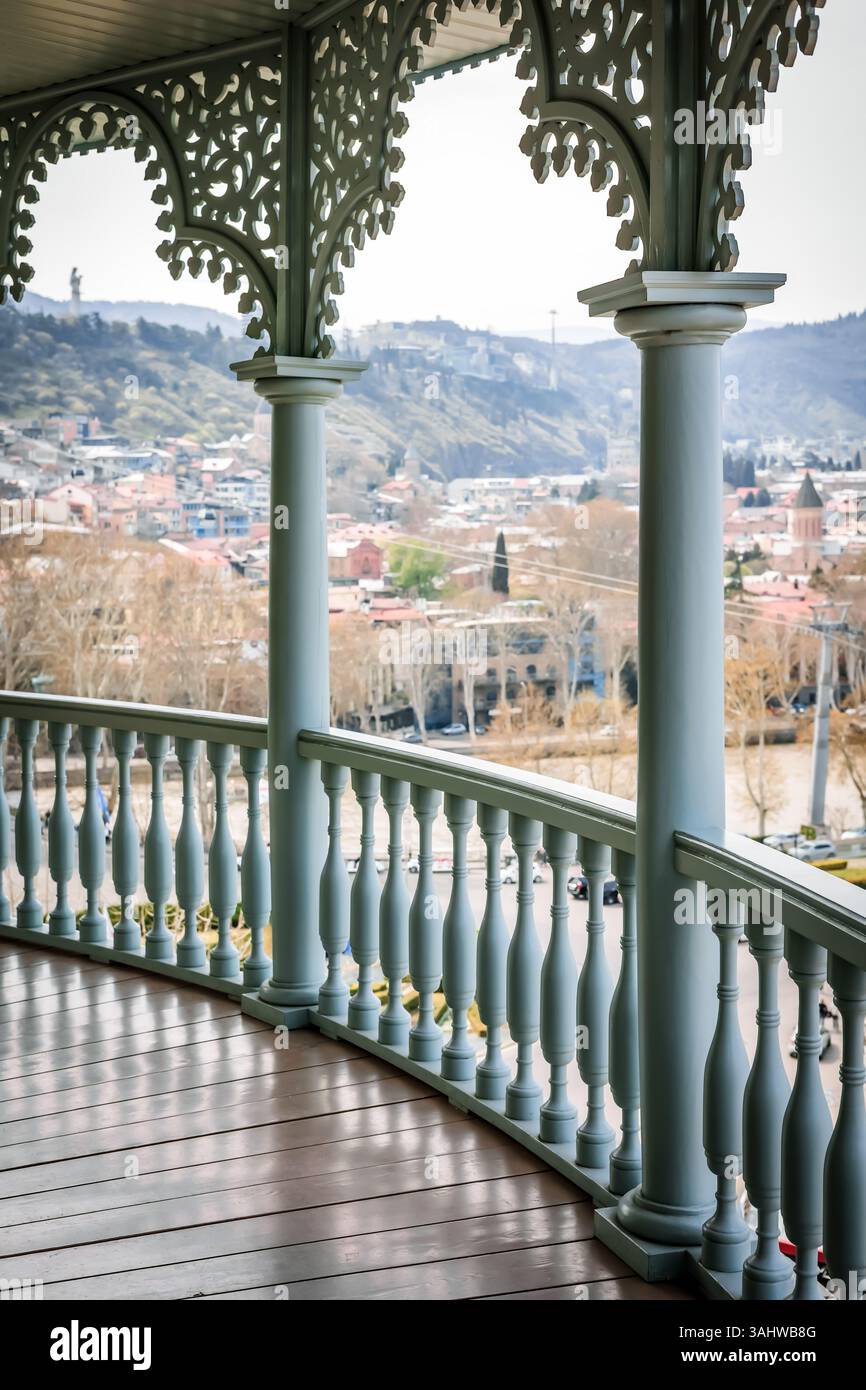 Beautiful traditional Georgian balcony with carved wooden elements and ...