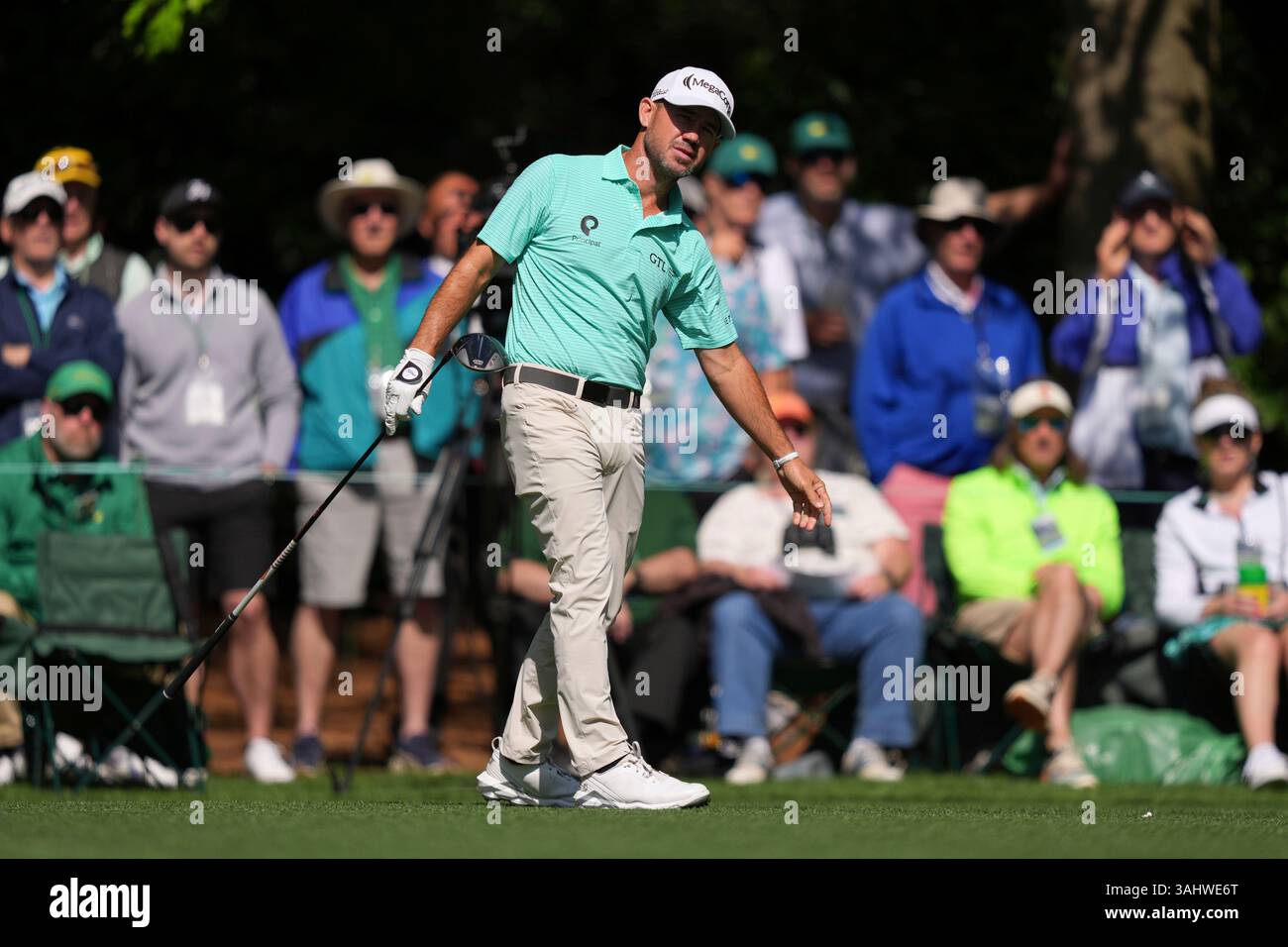 Brian Harman watches his tee shot on the seventh hole during the first ...