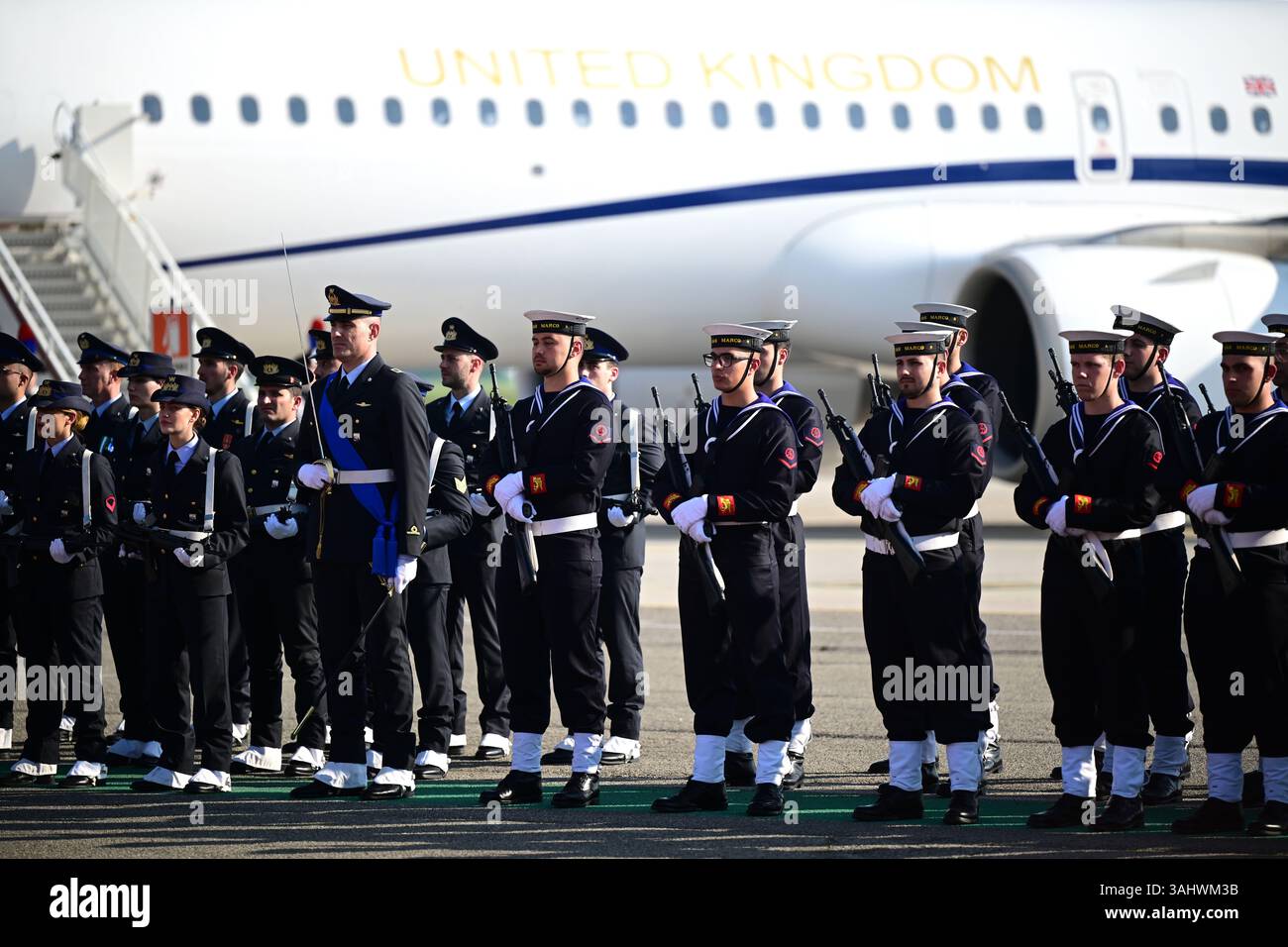 Military personnel wait for the departure of King Charles III and Queen ...