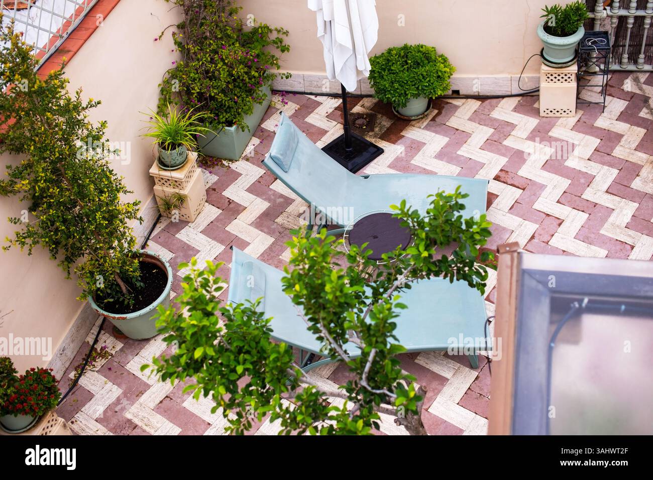 Relaxing Rooftop Terrace. Outdoor cafe terrace with tables and chairs ...