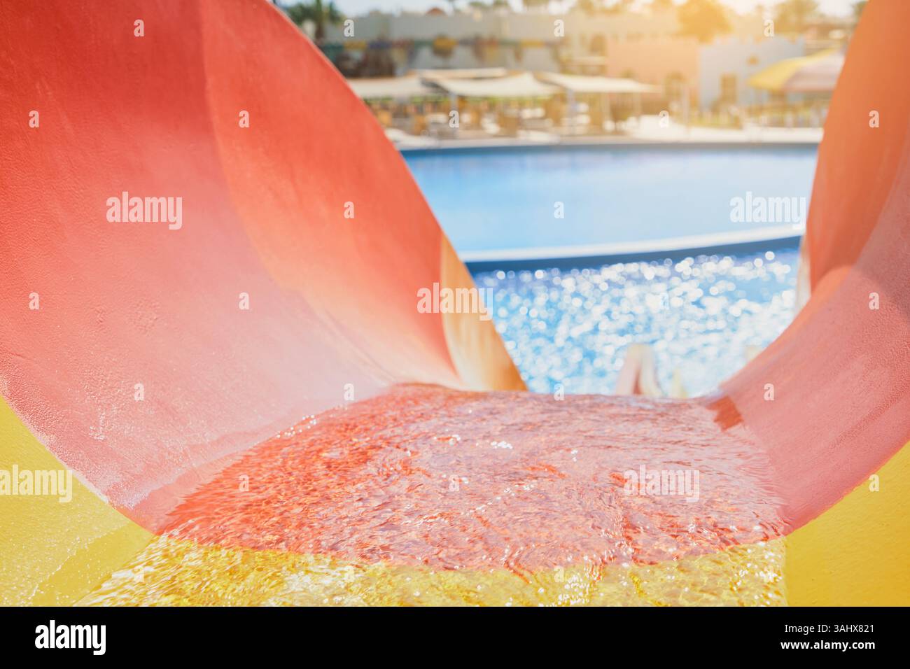 Water park with water colored flights, slides, splashes and pools at ...