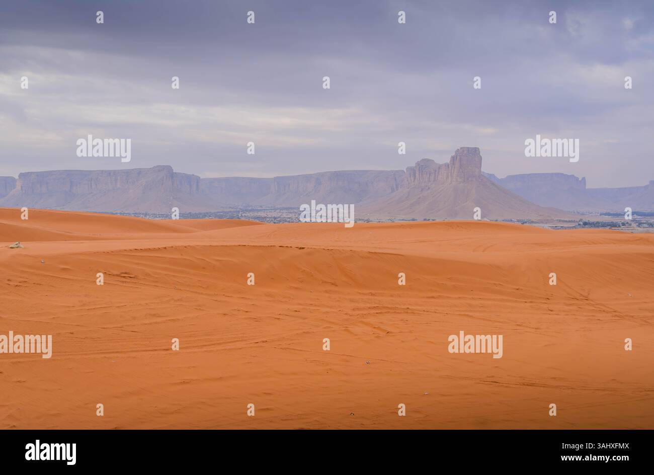 A panoramic view of vibrant Red Sand dunes in Saudi desert, capturing a ...