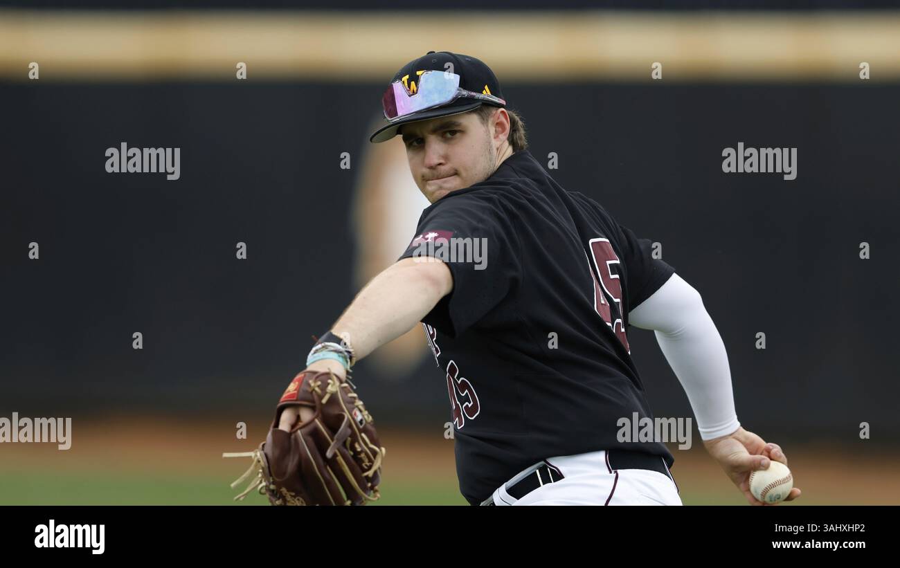 Winthrop pitcher Walker Brodt throws before an NCAA baseball game ...