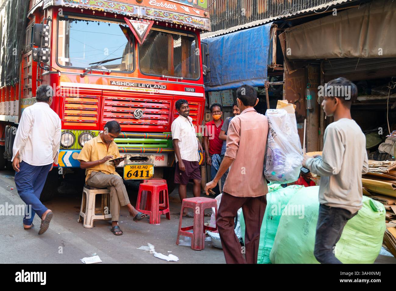 Streets of Mumbai, Masjid Bunder, India, small business and worker in ...