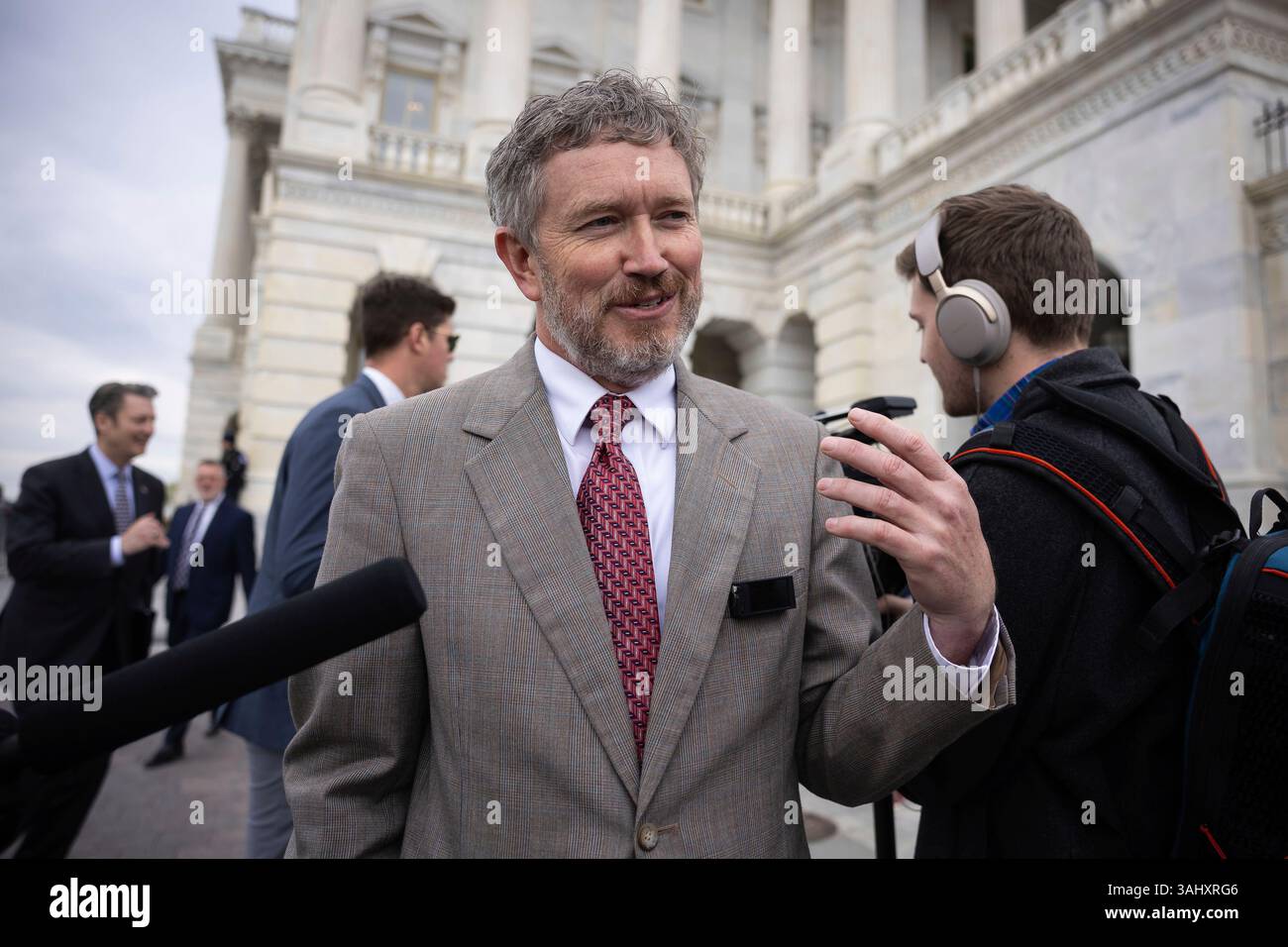 Rep. Thomas Massie (R-Ky.) speaks with reporters after voting against a ...