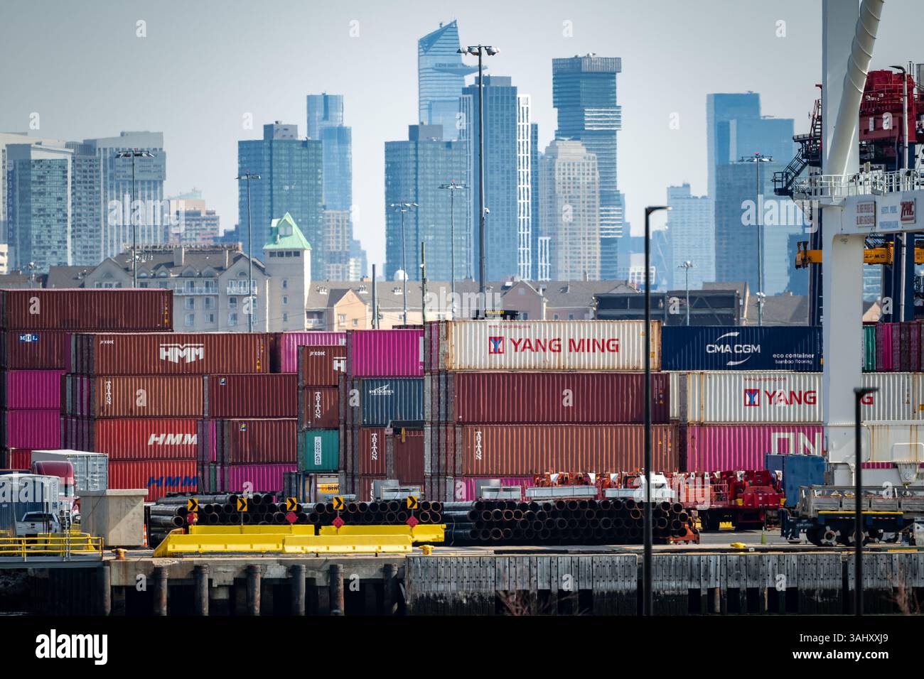 With the New York Manhattan skyline in the background, cargo shipping ...