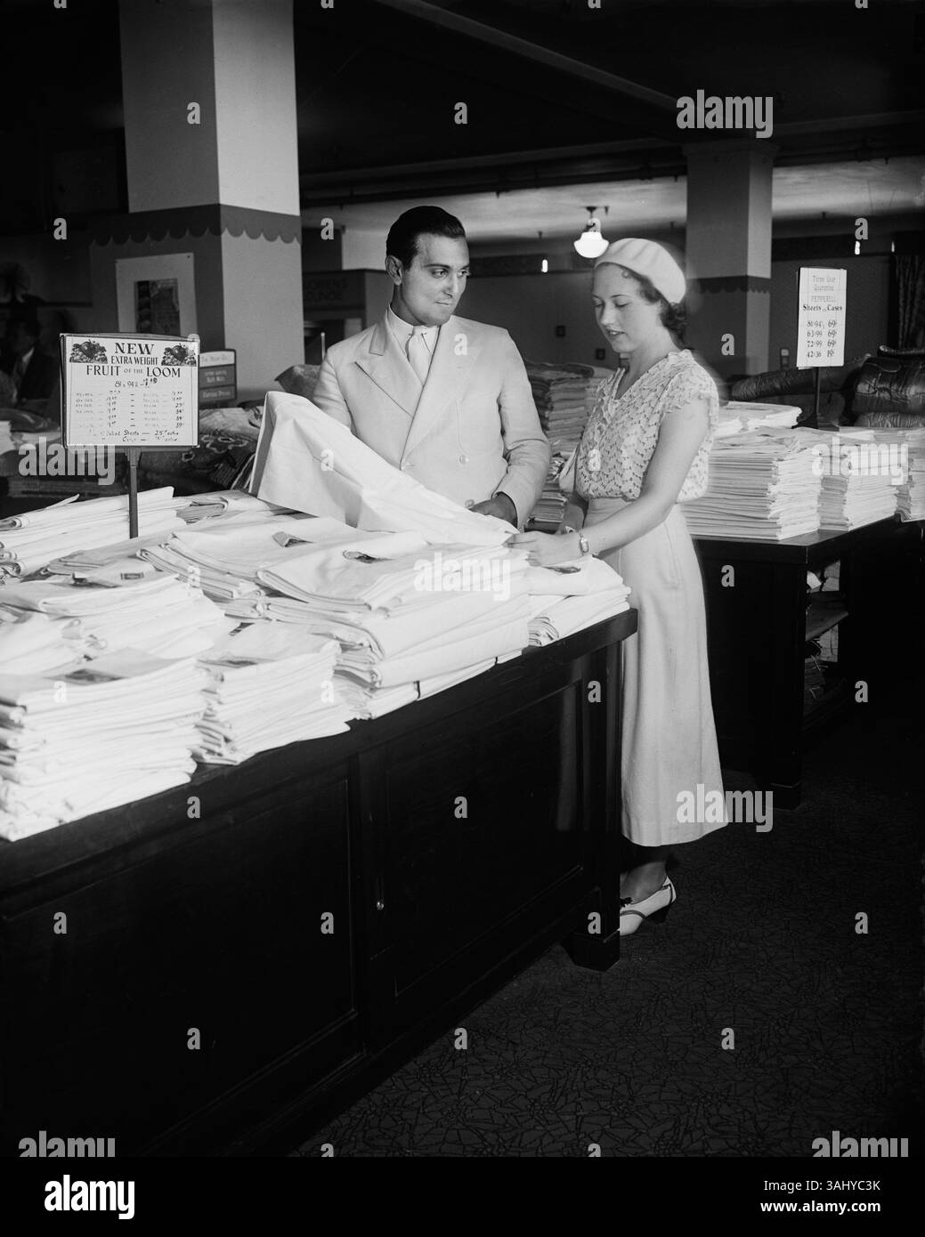 May 25, 2017 - Salesman Helping Customer with Linens, Harris & Ewing ...