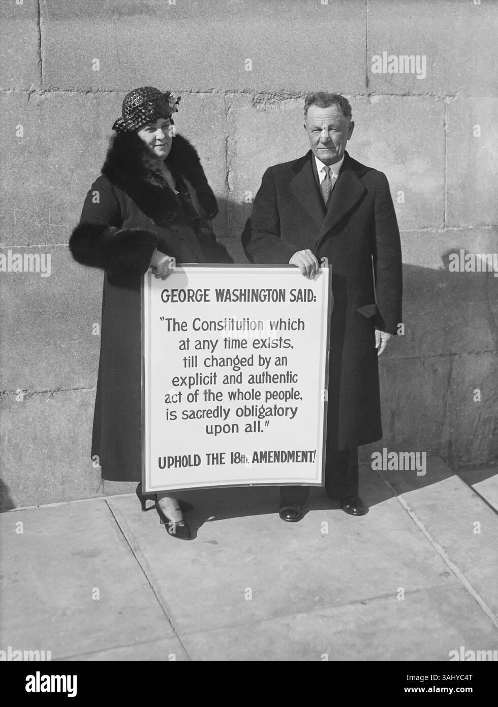 May 25, 2017 - Man and Woman Standing with Sign Supporting U.S ...