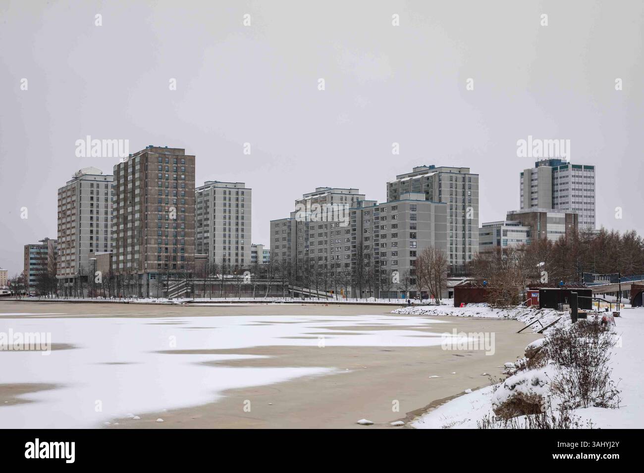 Brutalist architecture of waterfront Merihaka district on a gray winter ...
