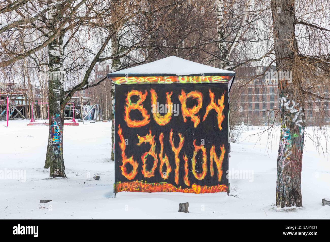 Burn Babylon. Graffiti on a snow-capped transformer substation in ...