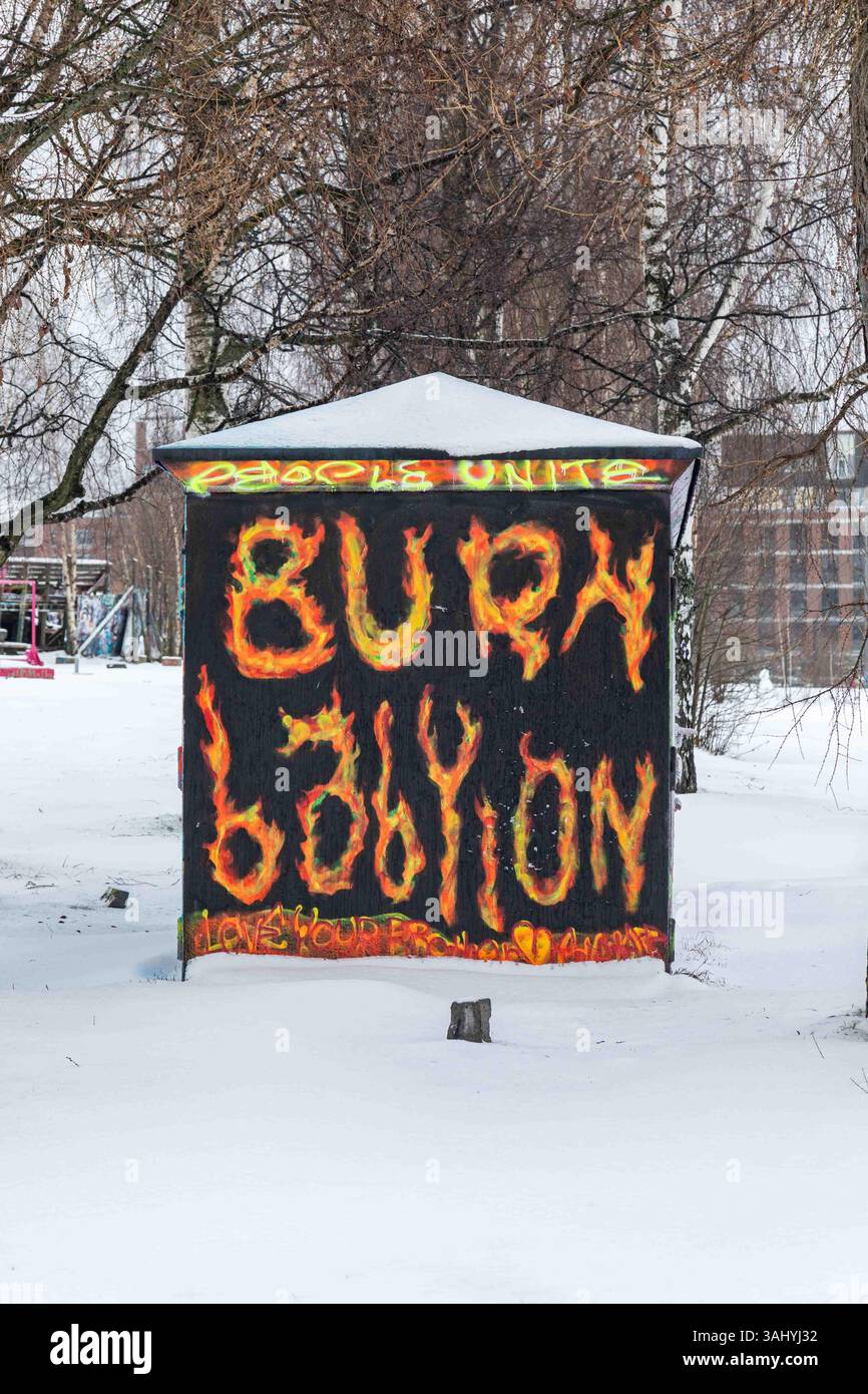 Burn Babylon graffiti on snow-capped transformer substation in ...