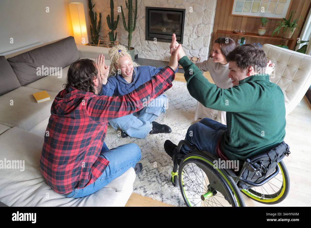 Disabled friends giving high hi-res stock photography and images - Alamy