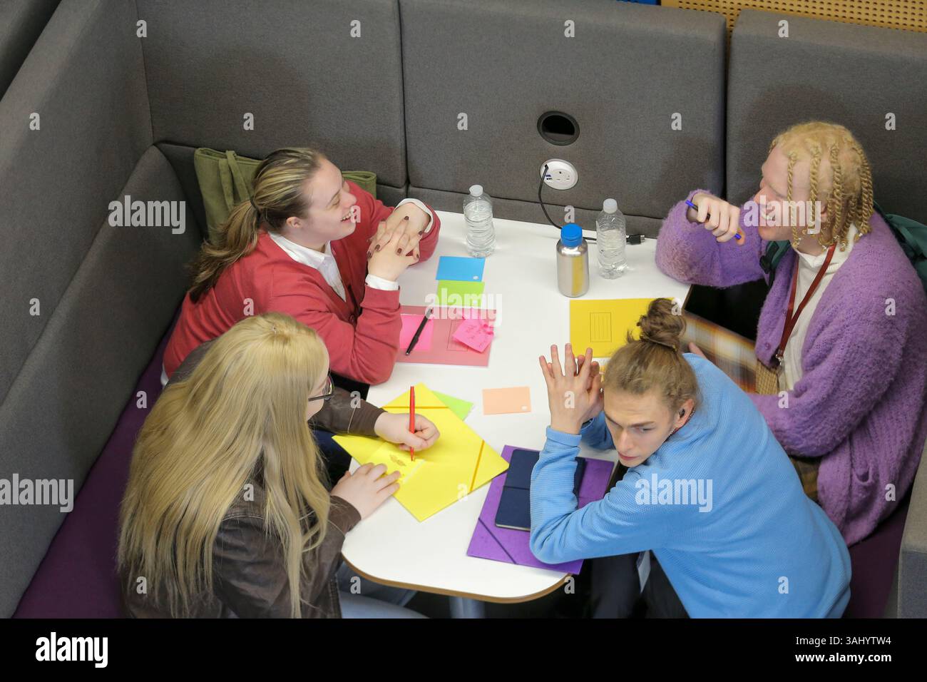 Disabled students brainstorming at university Stock Photo - Alamy