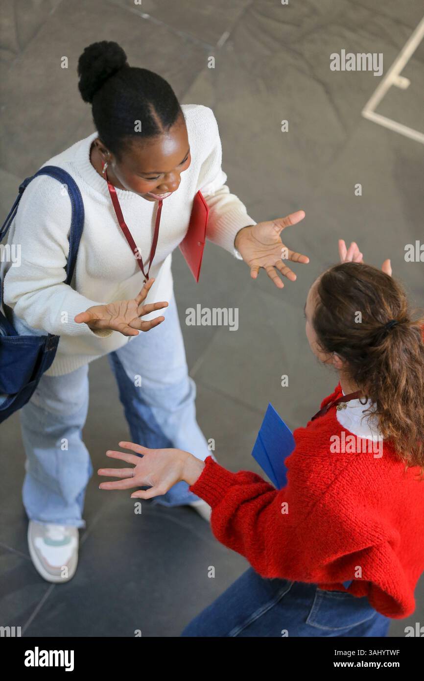 Disabled female friends at university Stock Photo - Alamy