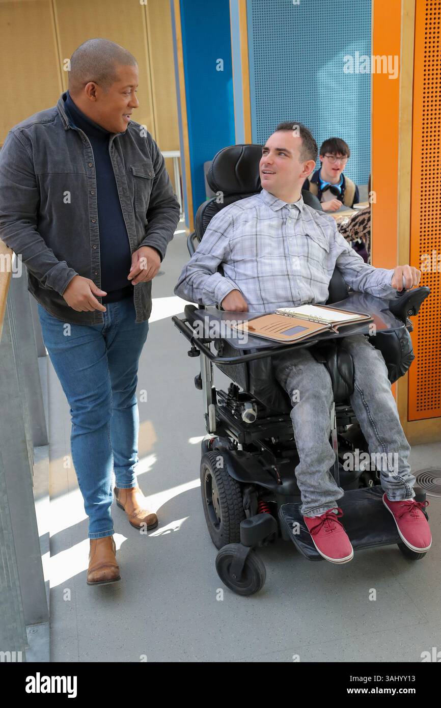 Teachers and students with disabilities at university Stock Photo - Alamy
