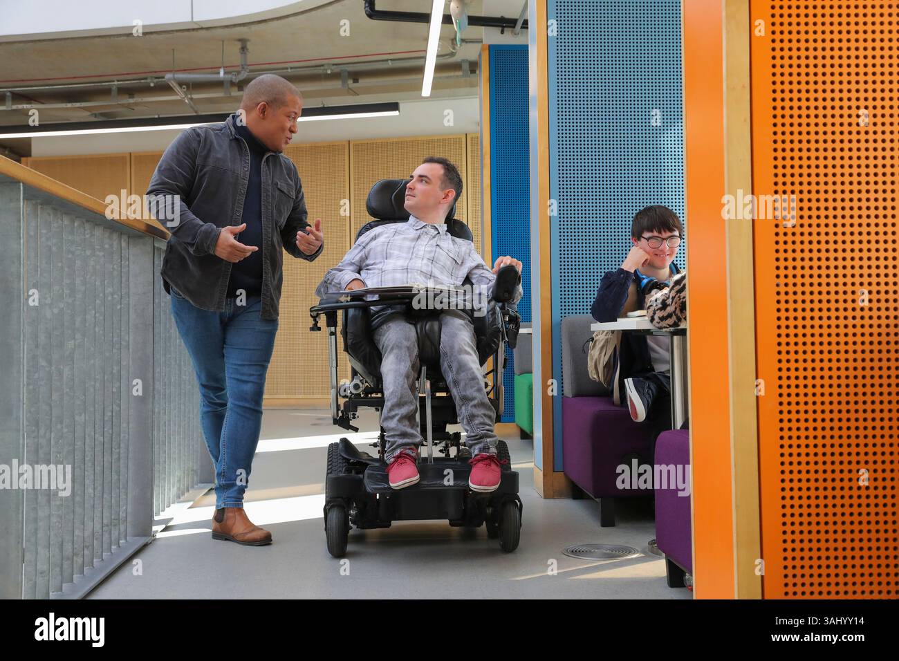 Teachers and students with disabilities at university Stock Photo - Alamy