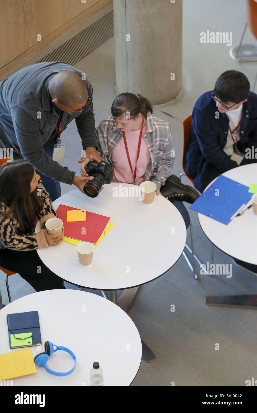 Disabled students and teacher at university Stock Photo - Alamy