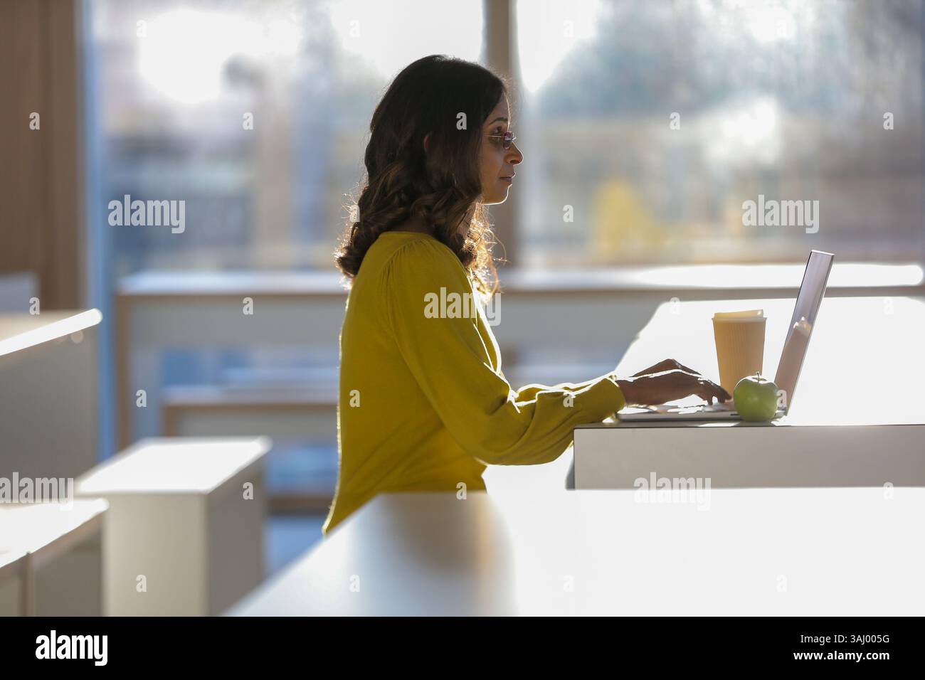 Woman disability working on hi-res stock photography and images - Alamy